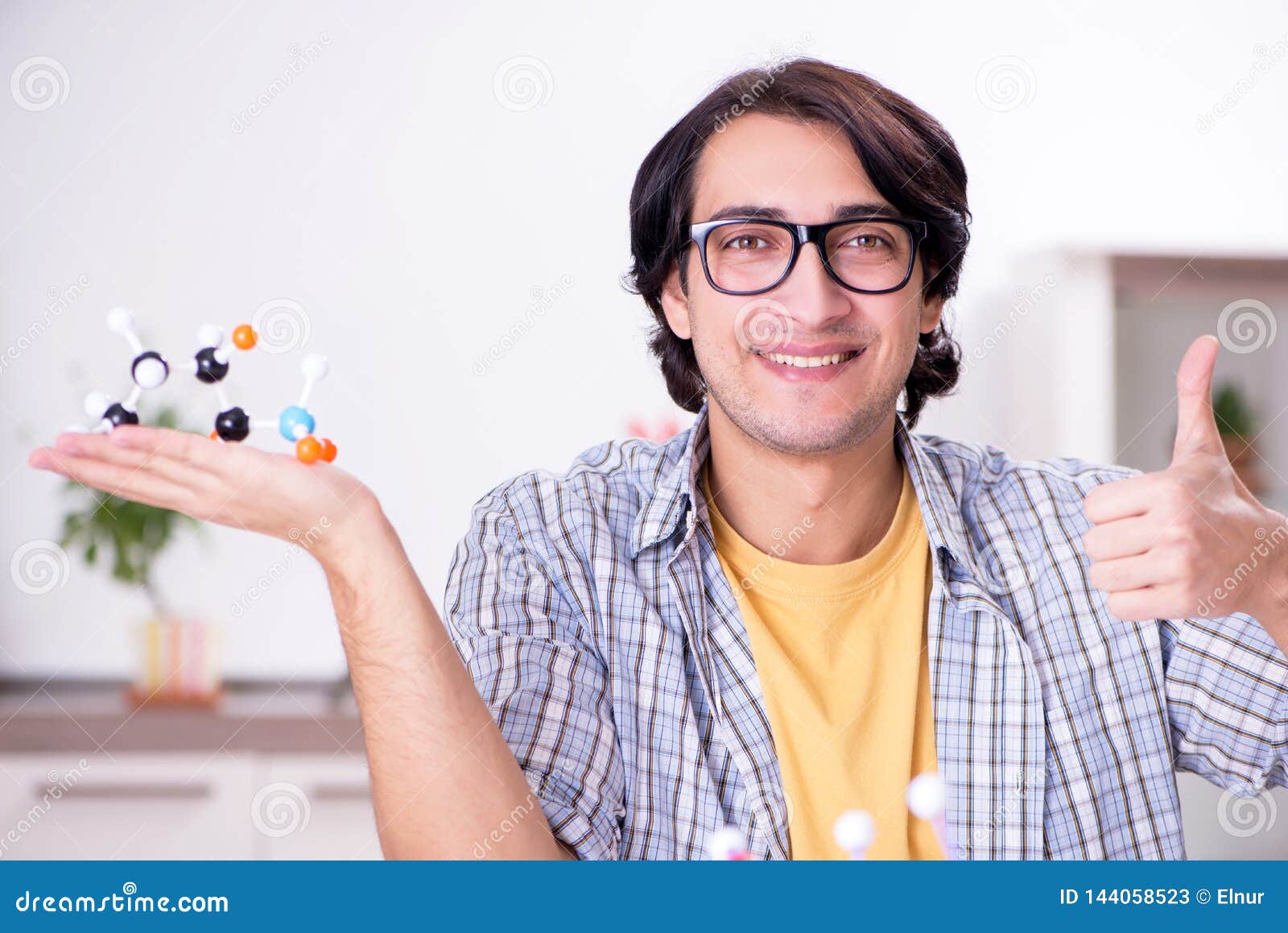 The Young Student Physicist Preparing for Exam at Home Stock Image ...
