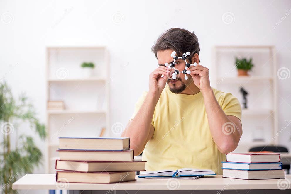 Young Male Student Physics Looking at Molecular Model Stock Image ...