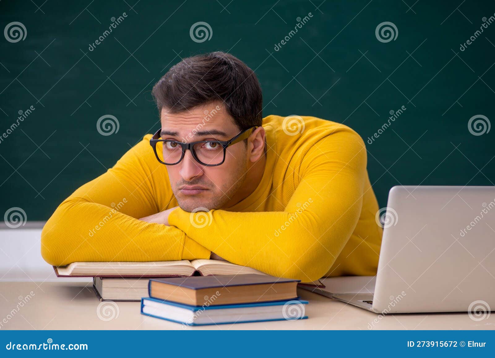 Young Male Student Sitting in the Classroom Stock Photo - Image of ...