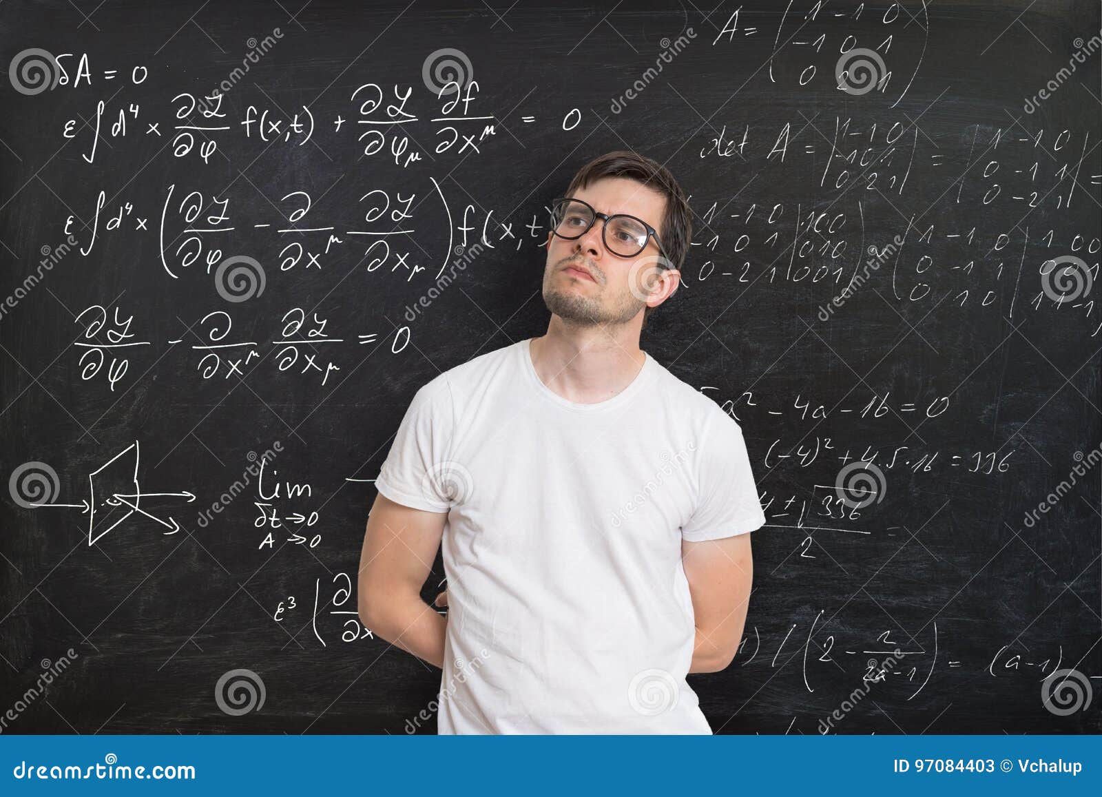 Young Student Is Solving Math Exam. Mathematics Formular On Blackboard ...