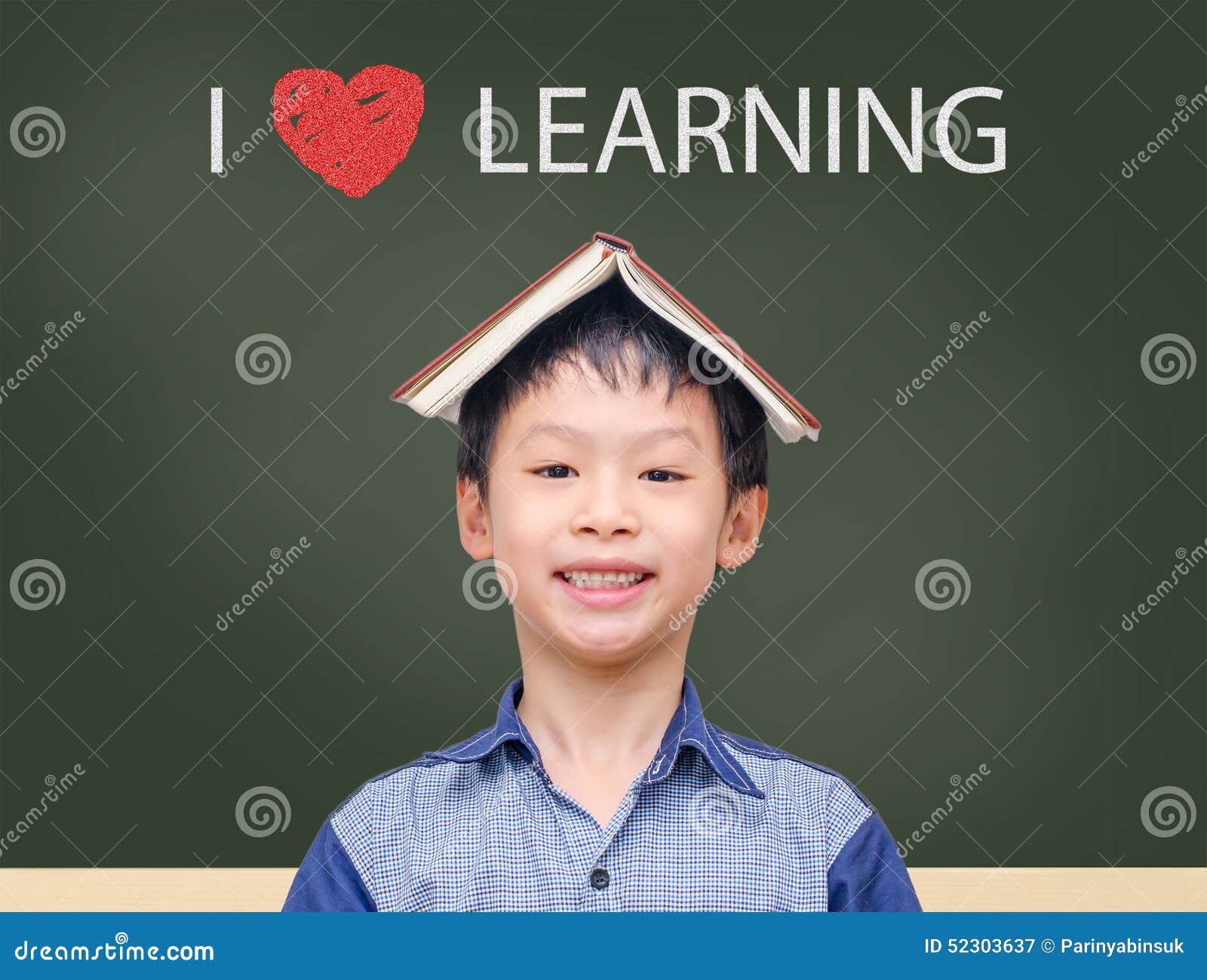 Young Student Standing with Book on Head Stock Image - Image of school ...