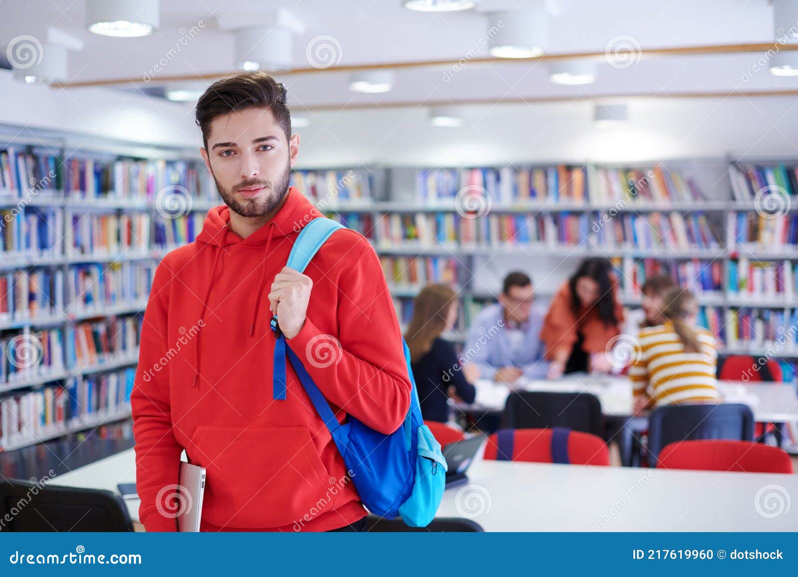 The Student Uses a Laptop and a School Library Stock Photo - Image of ...