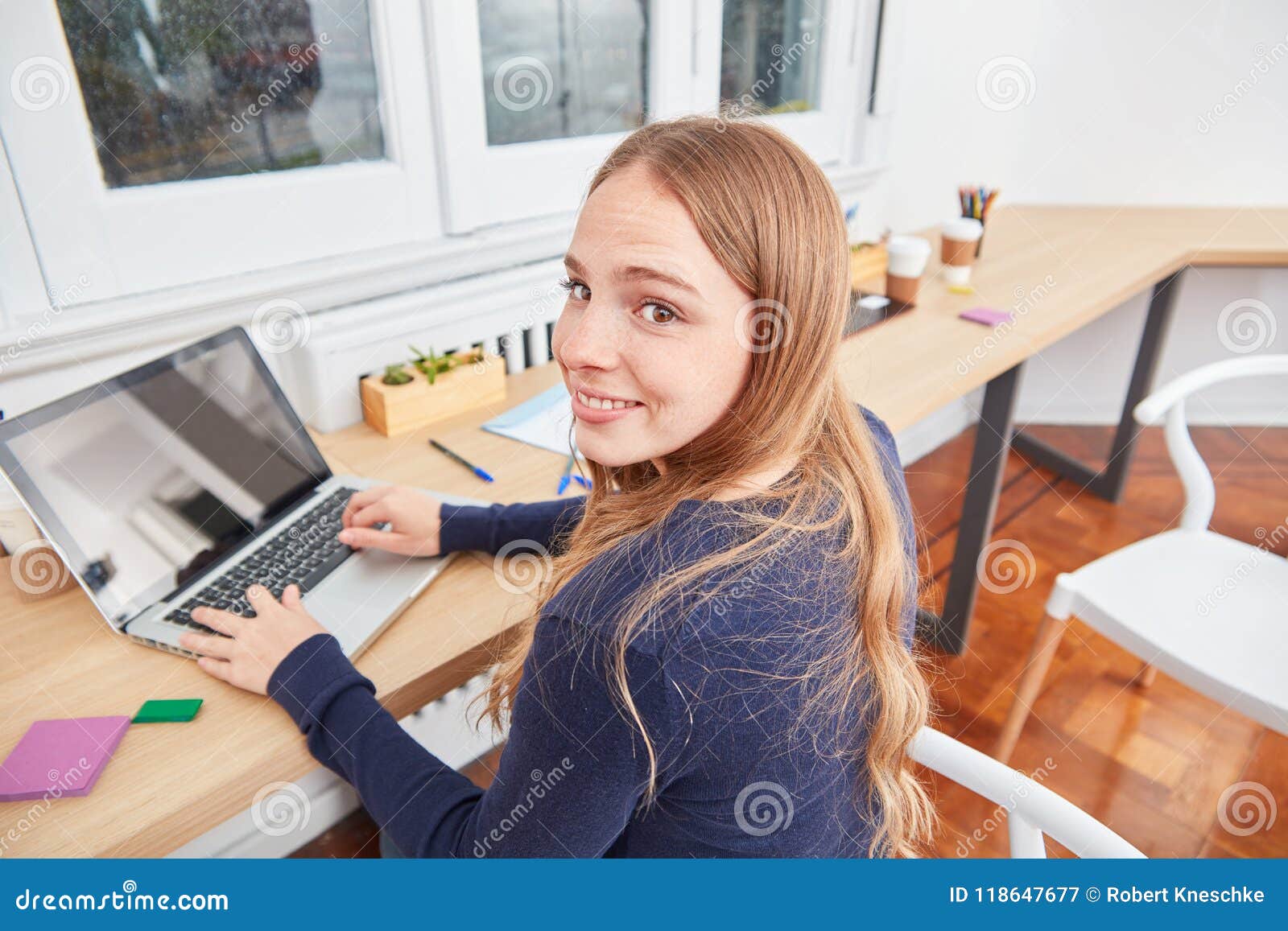 Young Female Student is Typing on the Laptop PC Stock Image - Image of ...