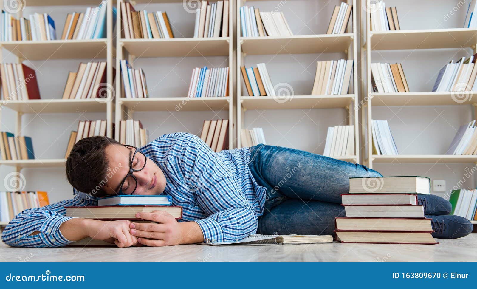 Young Student Studying with Books Stock Photo - Image of lying, college ...