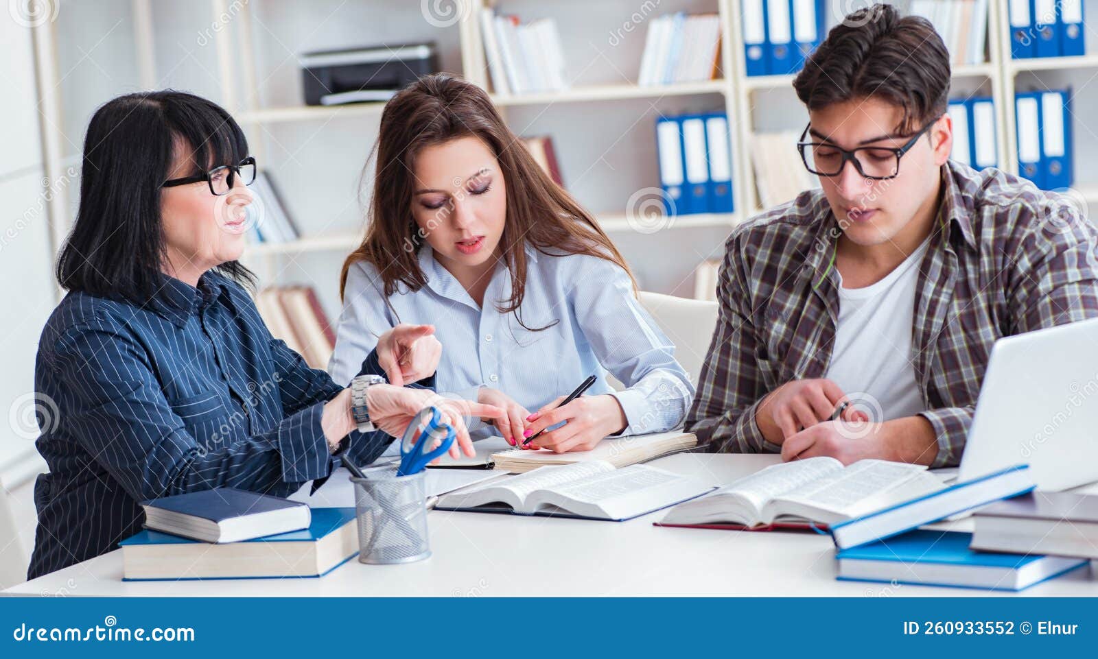 Young Student and Teacher during Tutoring Lesson Stock Photo - Image of ...