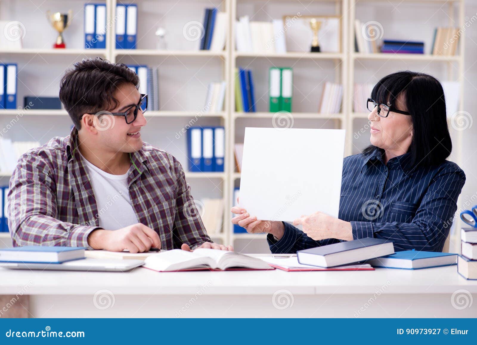 The Young Student and Teacher during Tutoring Lesson Stock Image ...
