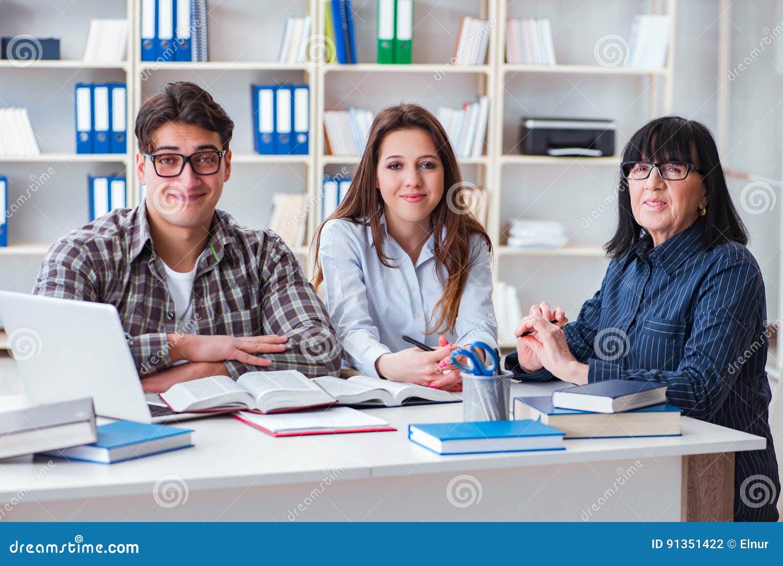 The Young Student and Teacher during Tutoring Lesson Stock Photo ...