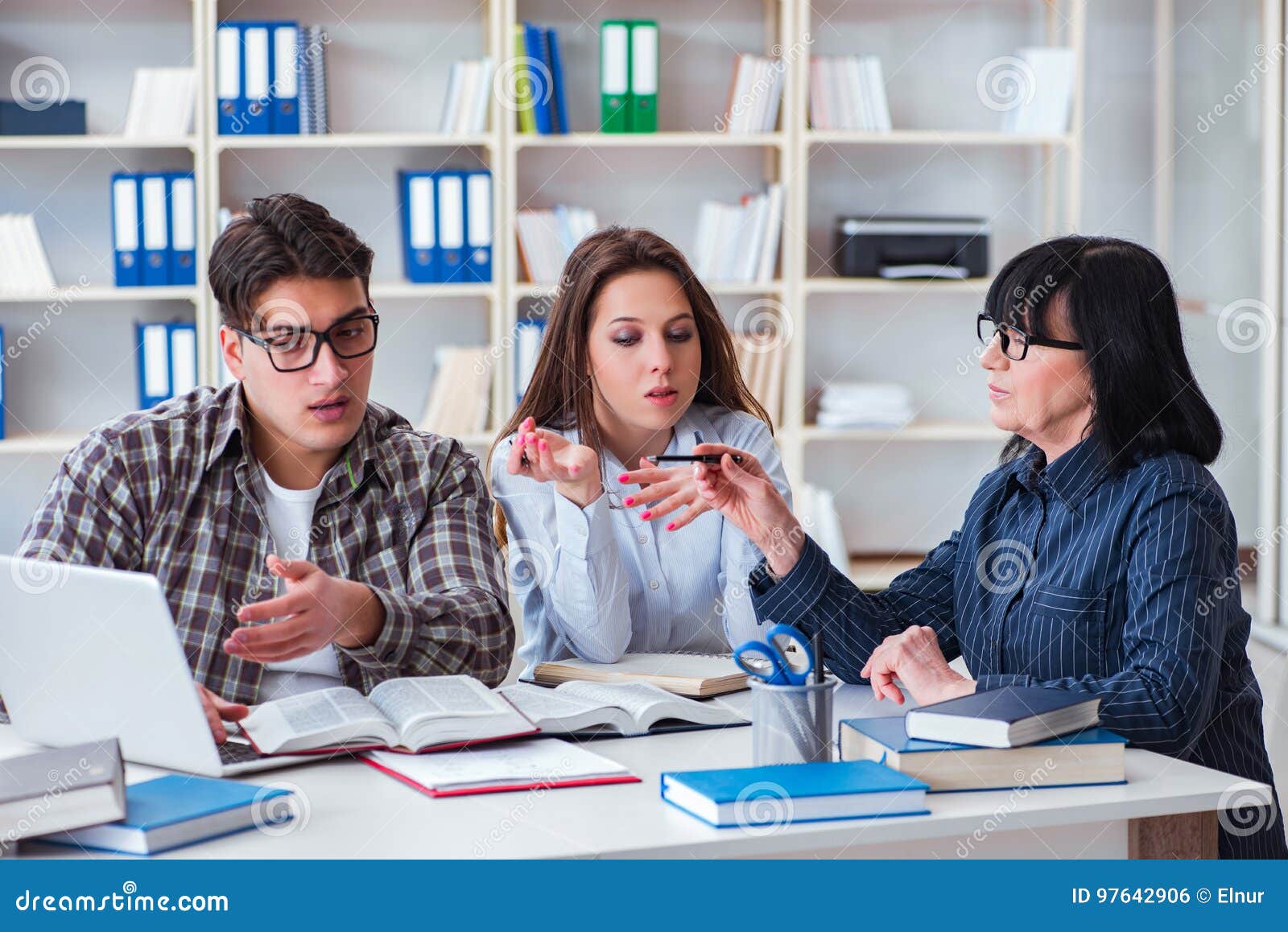 The Young Student and Teacher during Tutoring Lesson Stock Photo ...
