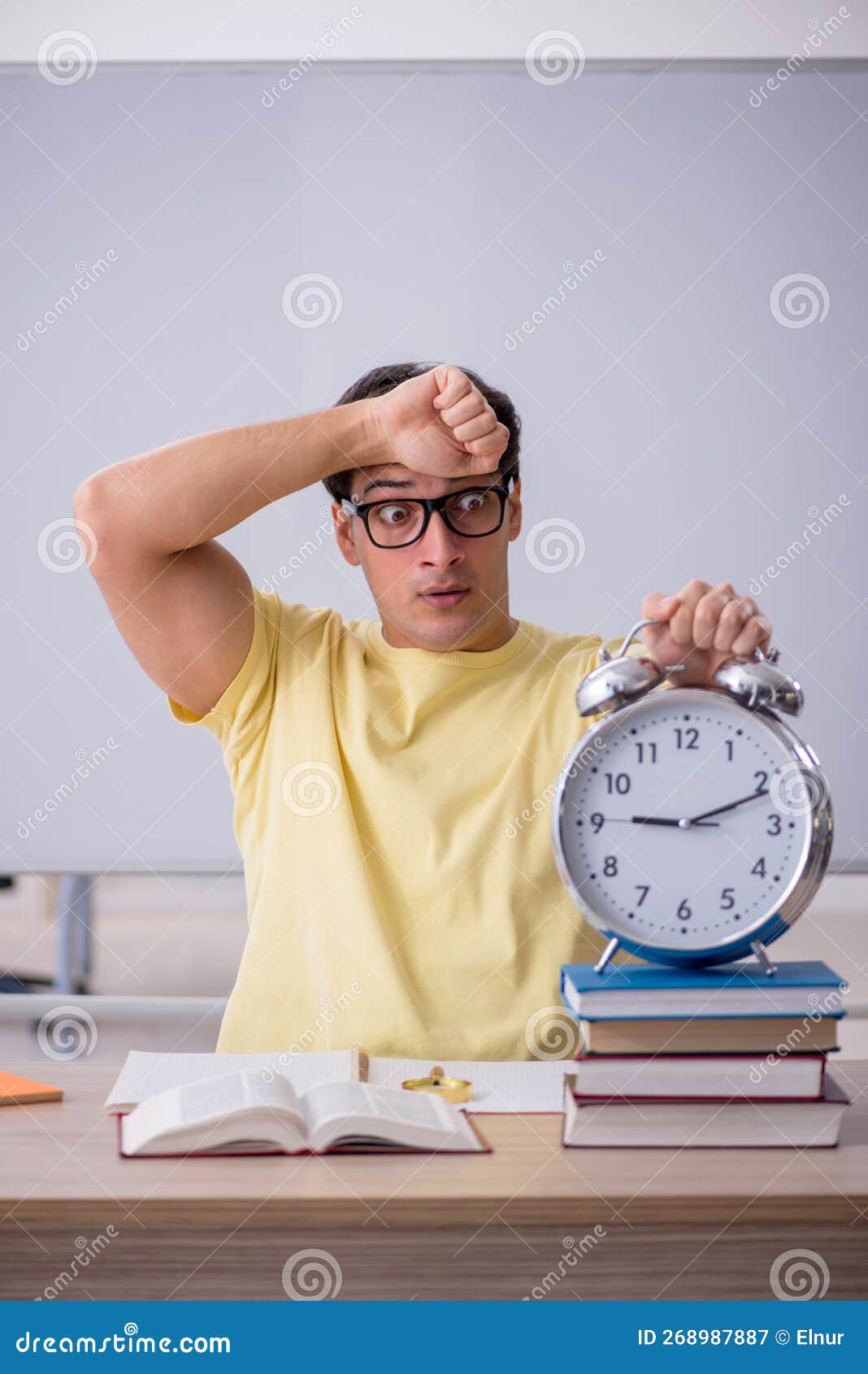 Young Male Student in Time Management Concept Stock Image - Image of ...