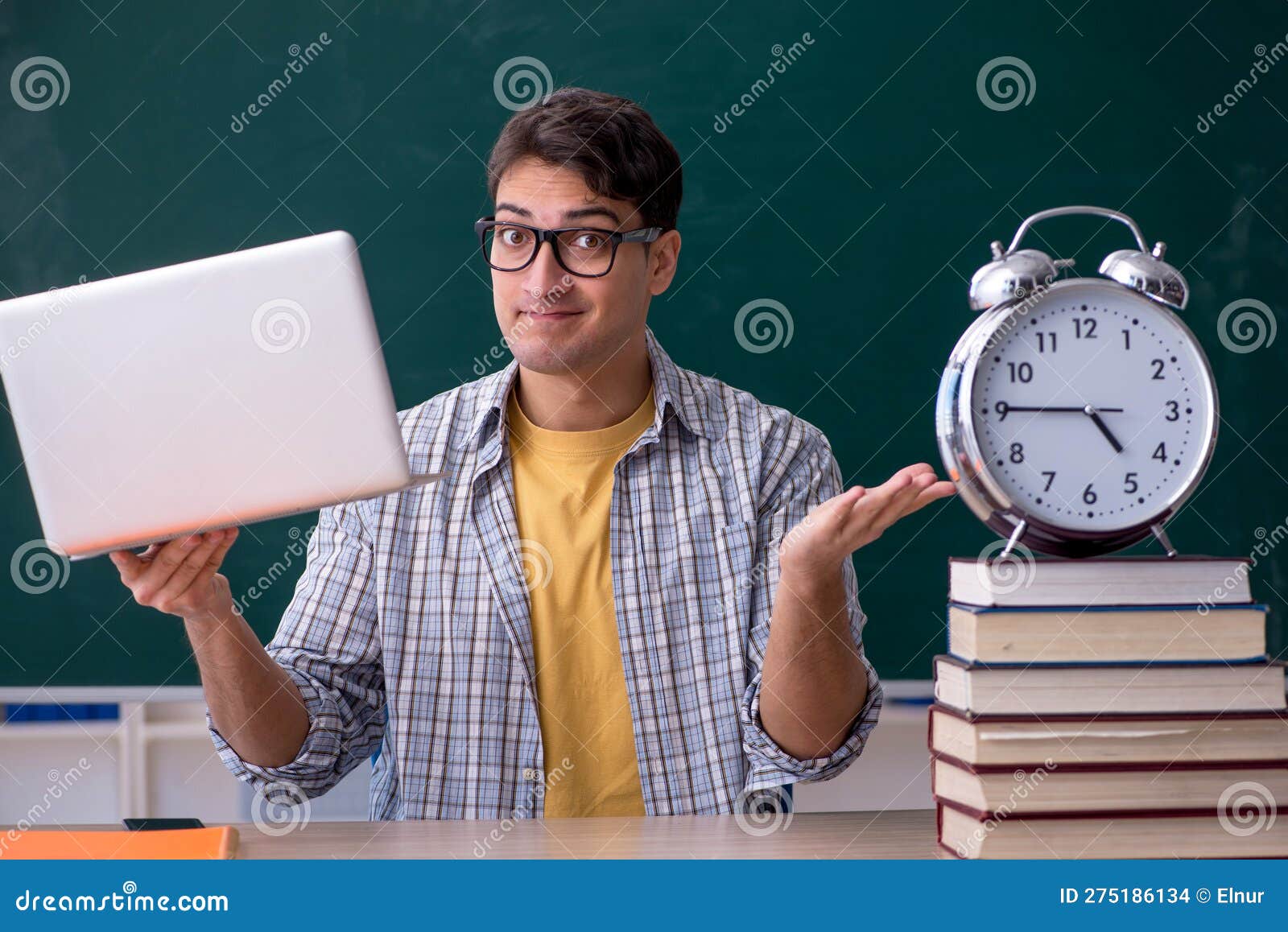 Young Male Student in Time Management Concept Stock Photo - Image of ...