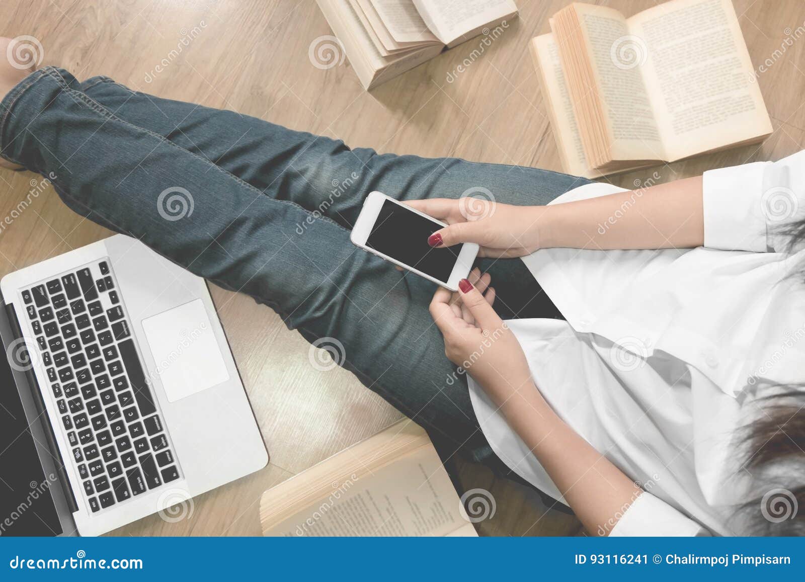 Young Student Using Smart Phone at the Library Stock Image - Image of ...