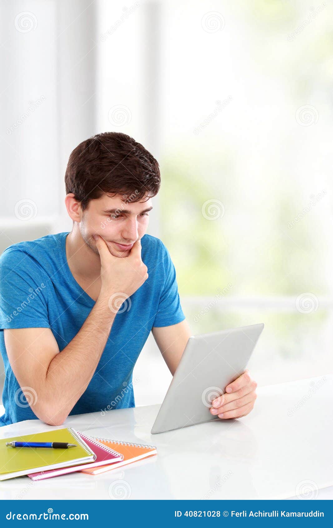 Young Student Using Tablet Pc Stock Photo - Image of male, learn: 40821028