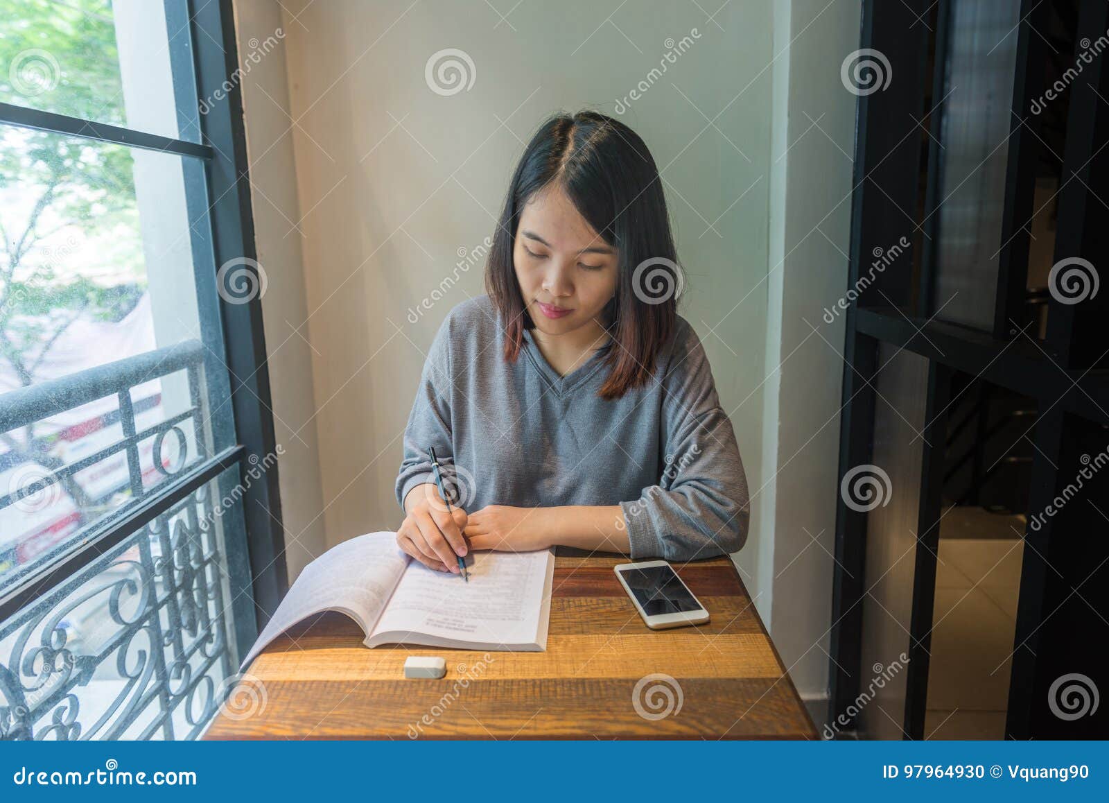 Young Student Writing Note, Take Note, Doing Homework on Book Stock ...