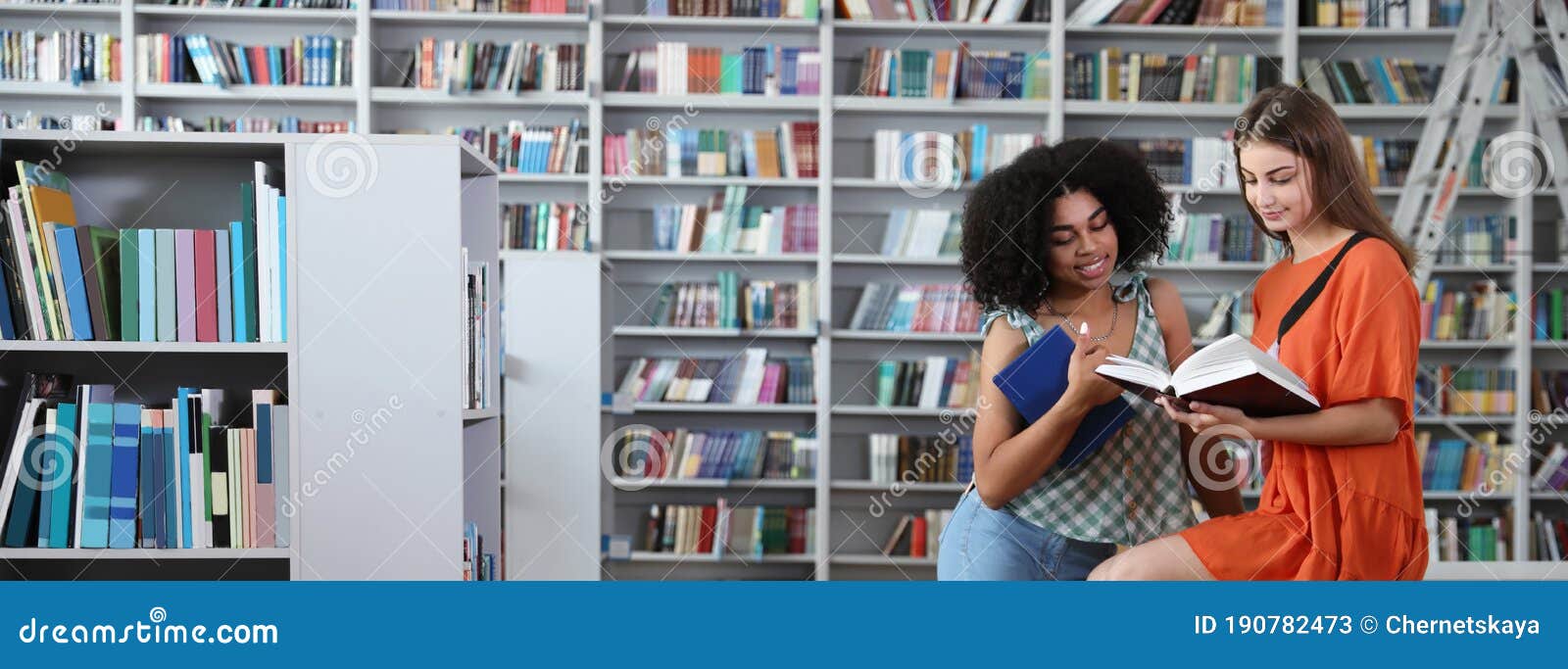 Young Students with Books in Library, Space for Text. Banner Design ...
