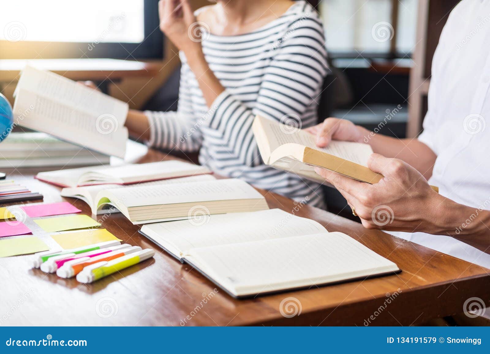 Young Students Classmates Help Friend Catching Up Workbook and Learning ...