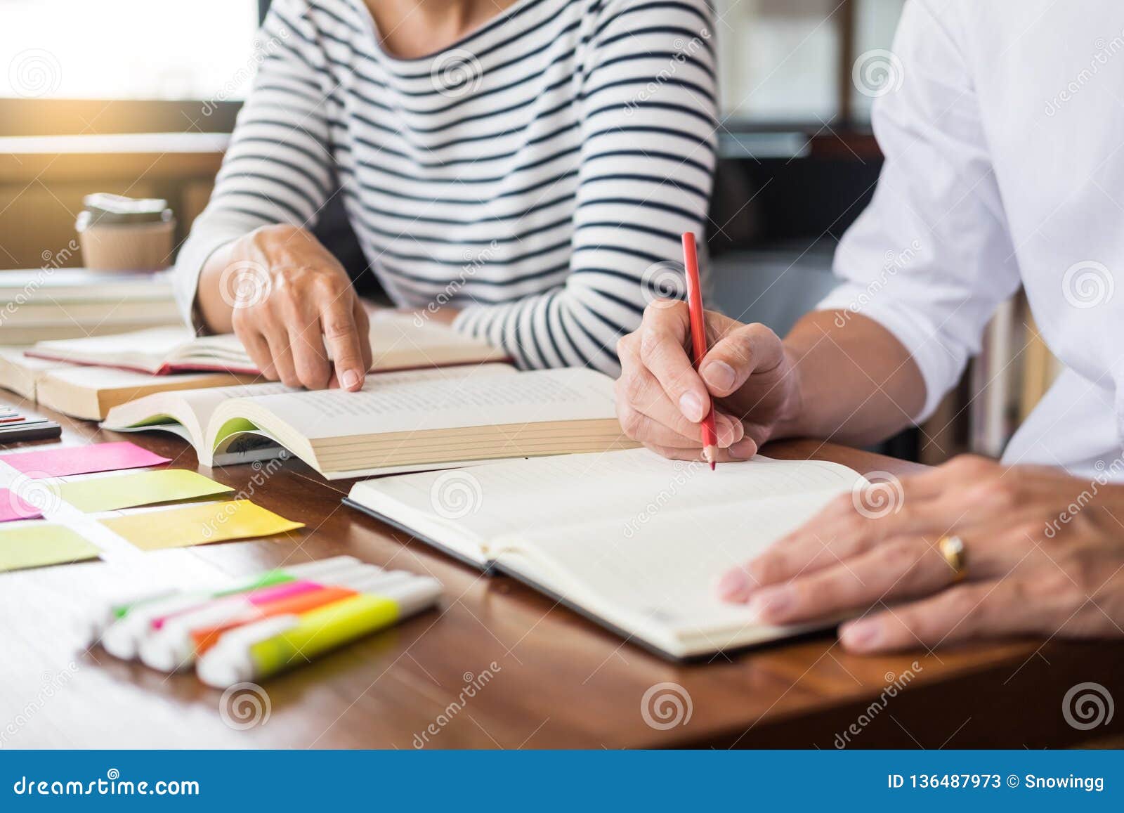 Young Students Classmates Help Friend Catching Up Workbook and Learning ...