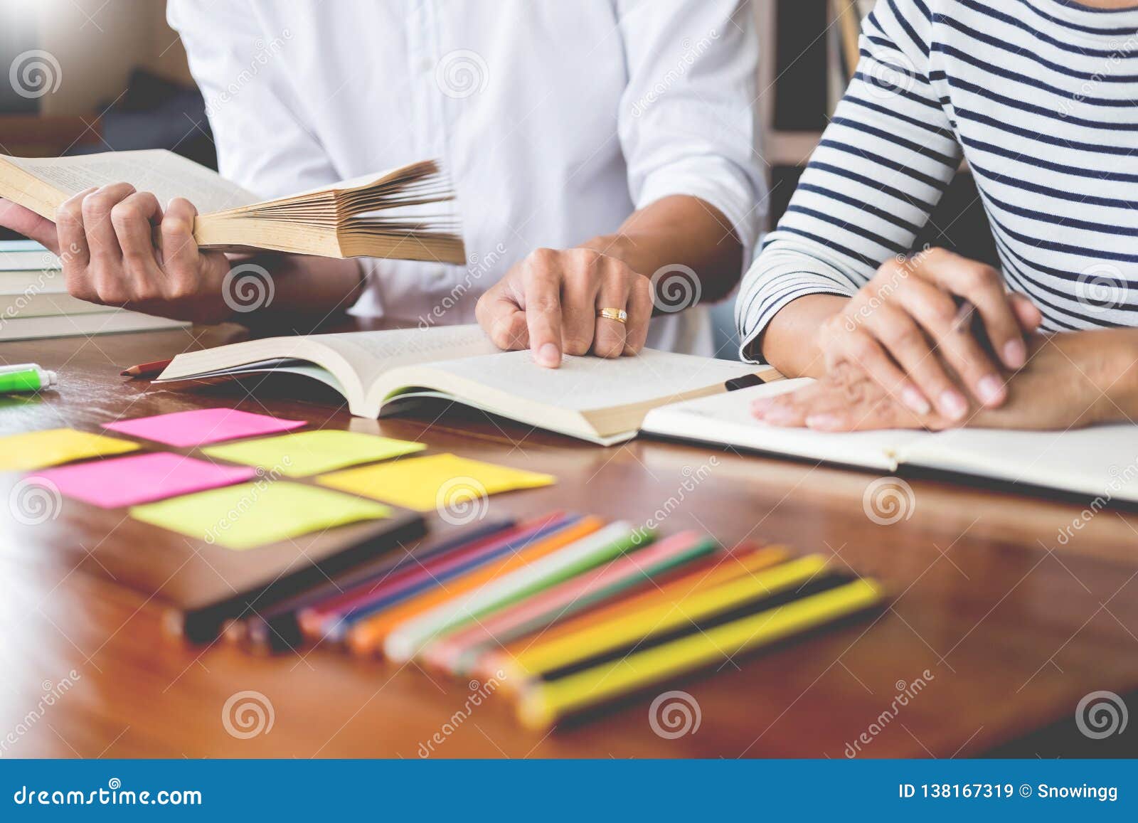 Young Students Classmates Help Friend Catching Up Workbook and Learning ...