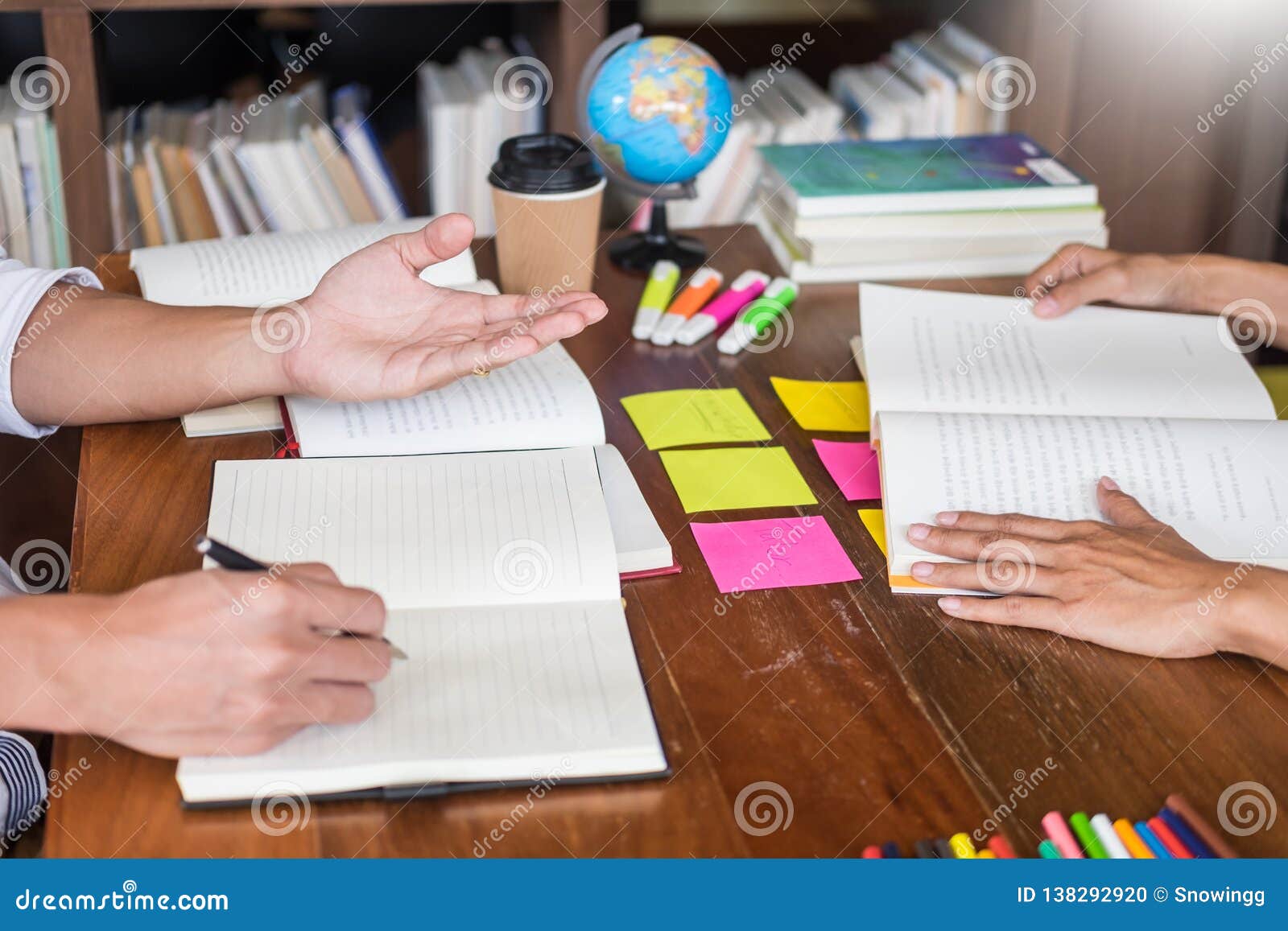Young Students Classmates Help Friend Catching Up Workbook and Learning ...