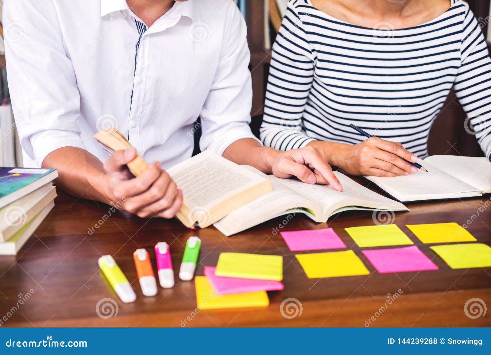 Young Students Classmates Help Friend Catching Up Workbook and Learning ...