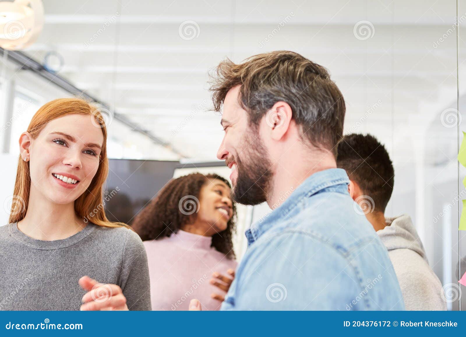 Young Students or Colleagues in Small Talk Stock Photo - Image of ...