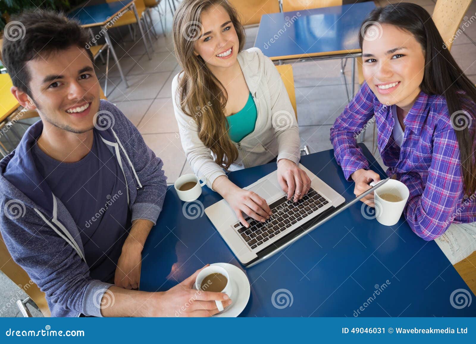 Young Students Doing Assignment on Laptop Together Stock Image - Image ...