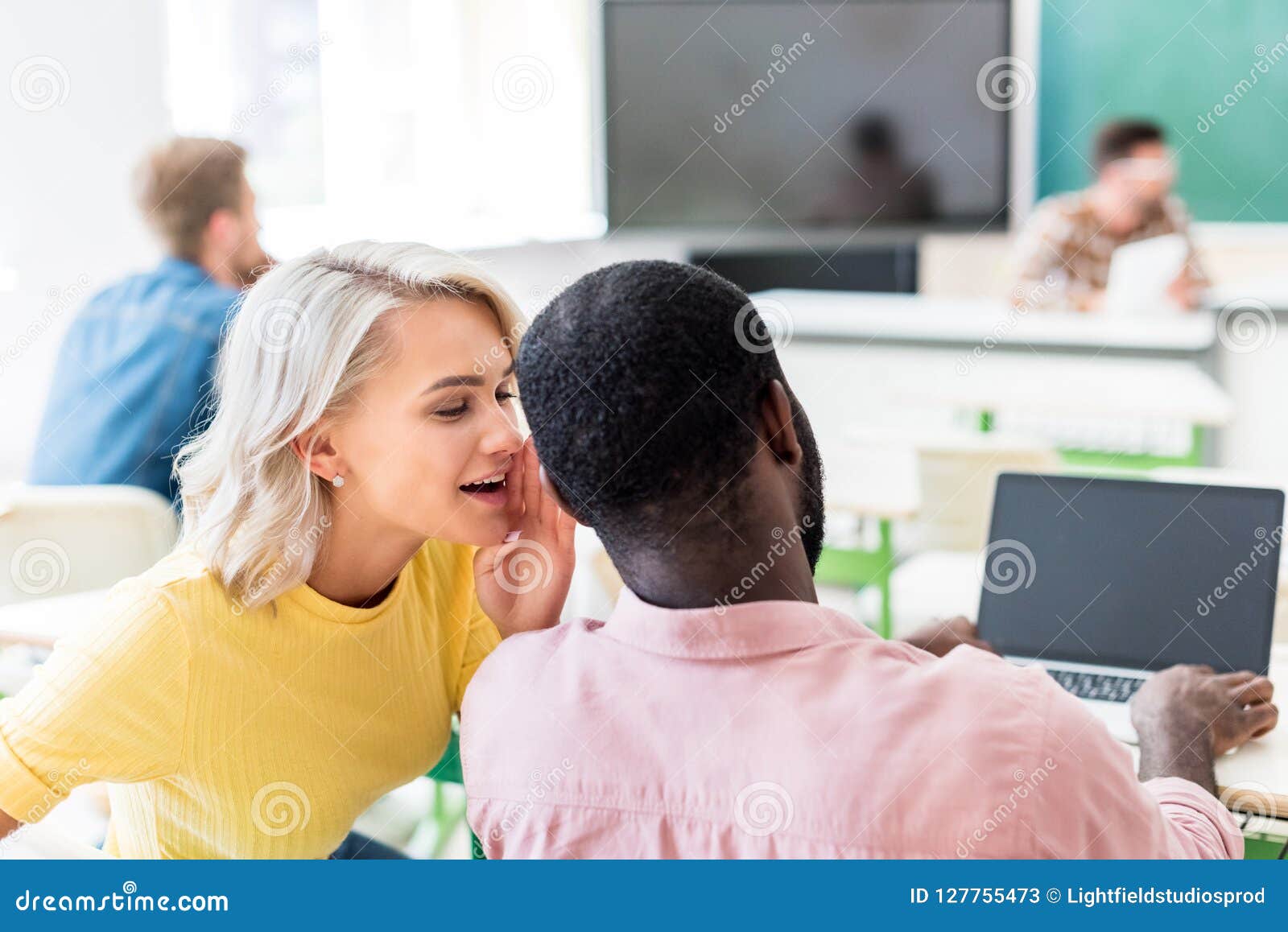 Young Students Gossiping at Classroom Stock Image - Image of ...