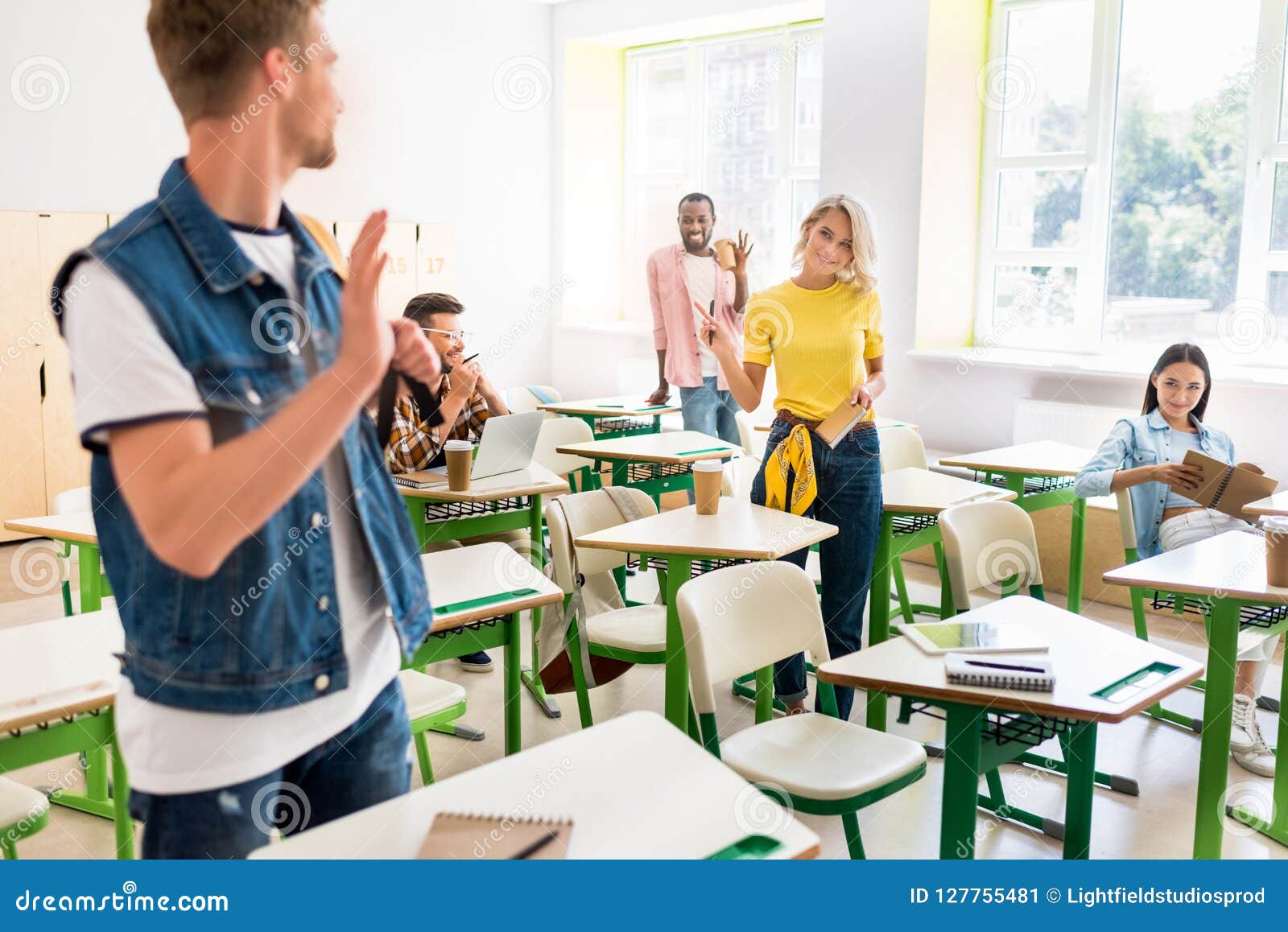 Young Students Greeting Each Other Stock Image - Image of youth, school ...