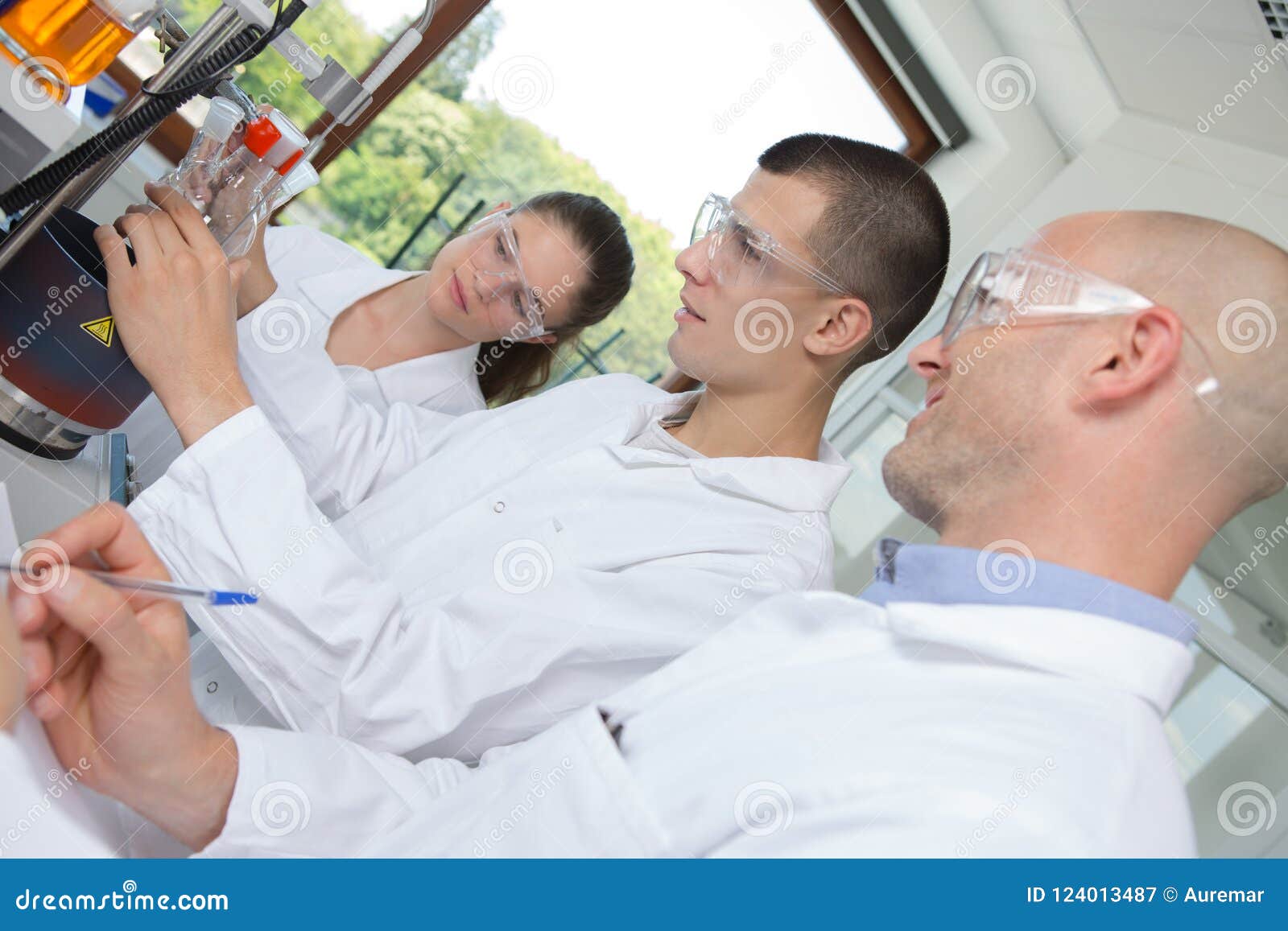Young Students Group in Bright Chemistry Lab Stock Image - Image of ...