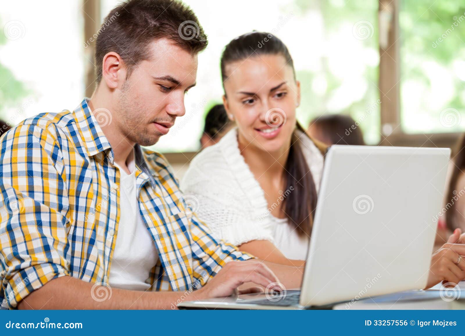 Young students with laptop stock photo. Image of classmate - 33257556