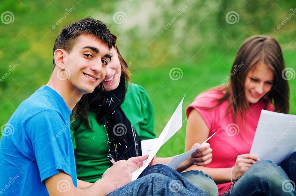 Young Students Learning Outdoor Stock Image - Image of outdoor, college ...