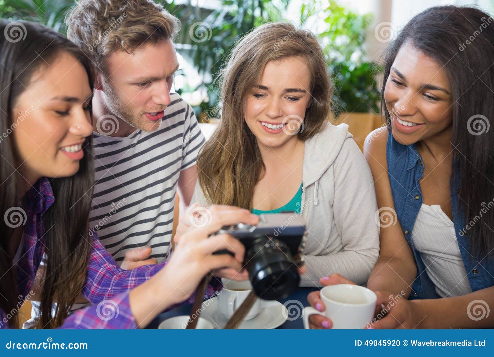 Young Students Looking at a Camera Stock Photo - Image of acade ...