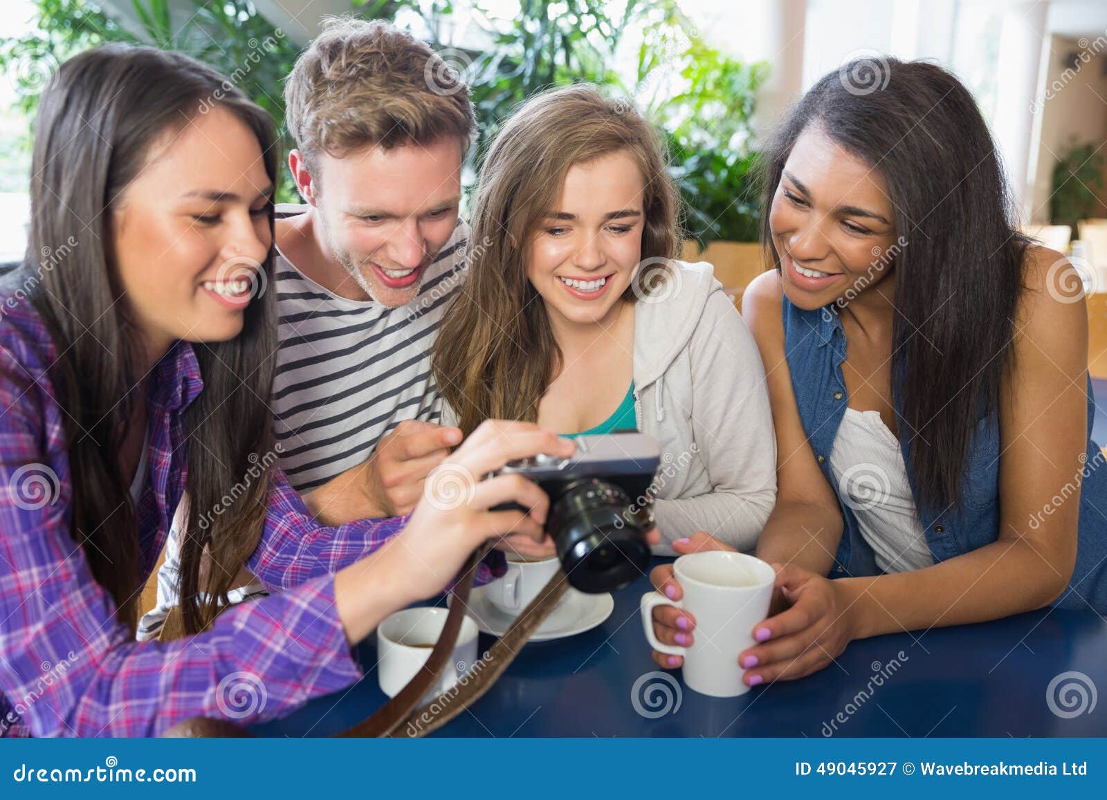 Young Students Looking at a Camera Stock Image - Image of male, people ...