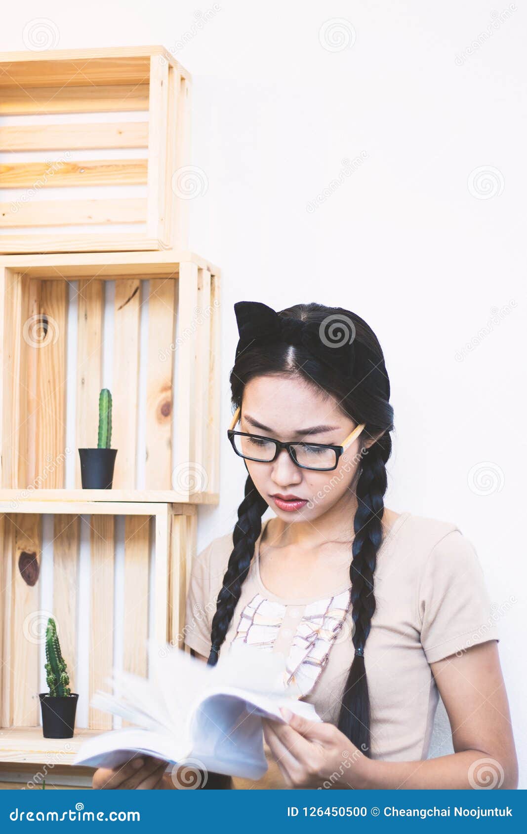 Young Students are Reading Books Stock Photo - Image of education ...