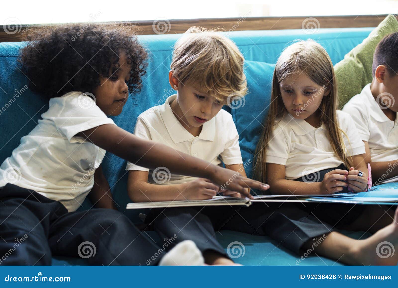 Young Students Reading Children Story Book Stock Photo - Image of ...