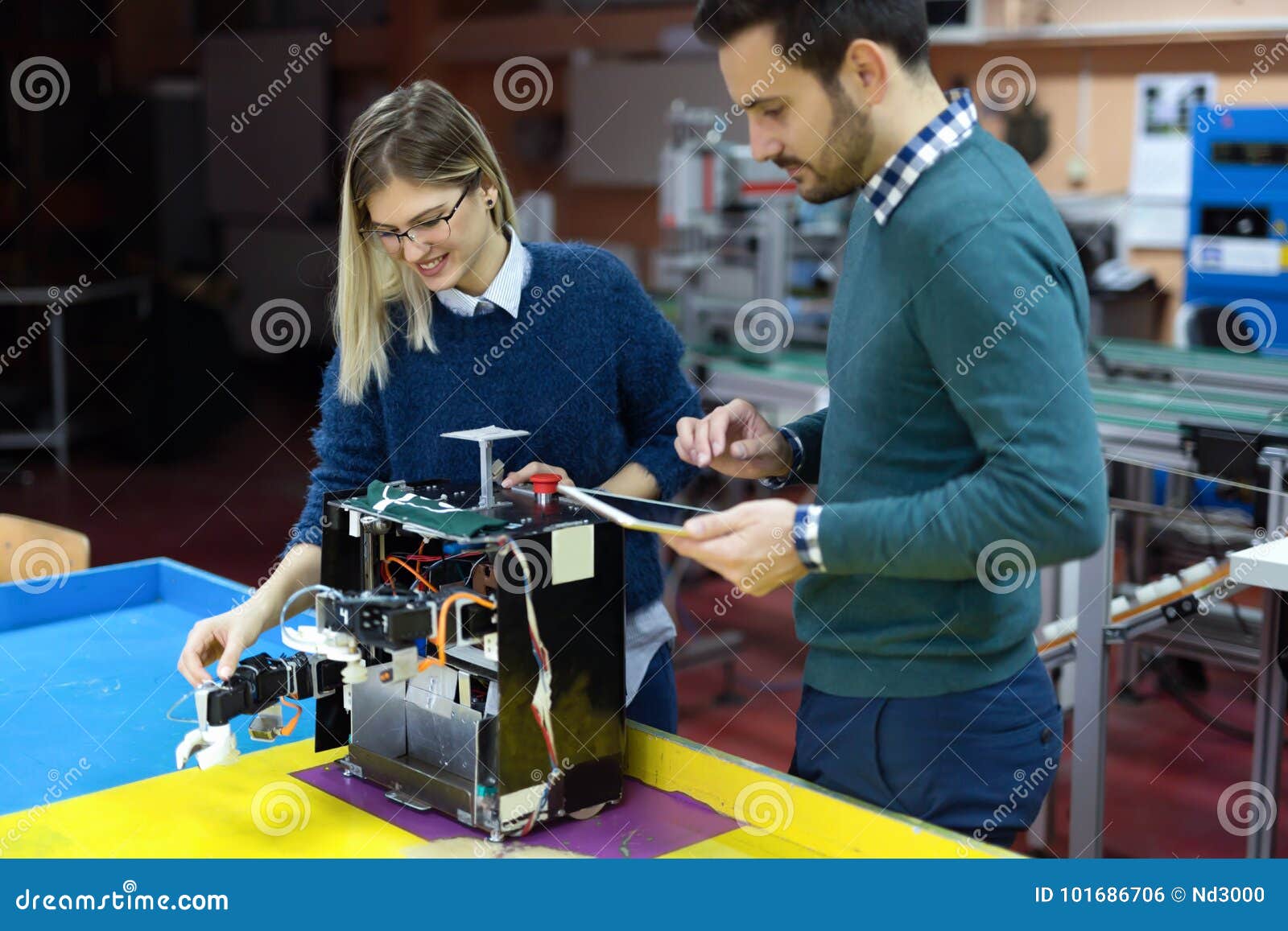 Young Students of Robotics Preparing Robot for Testing Stock Photo ...