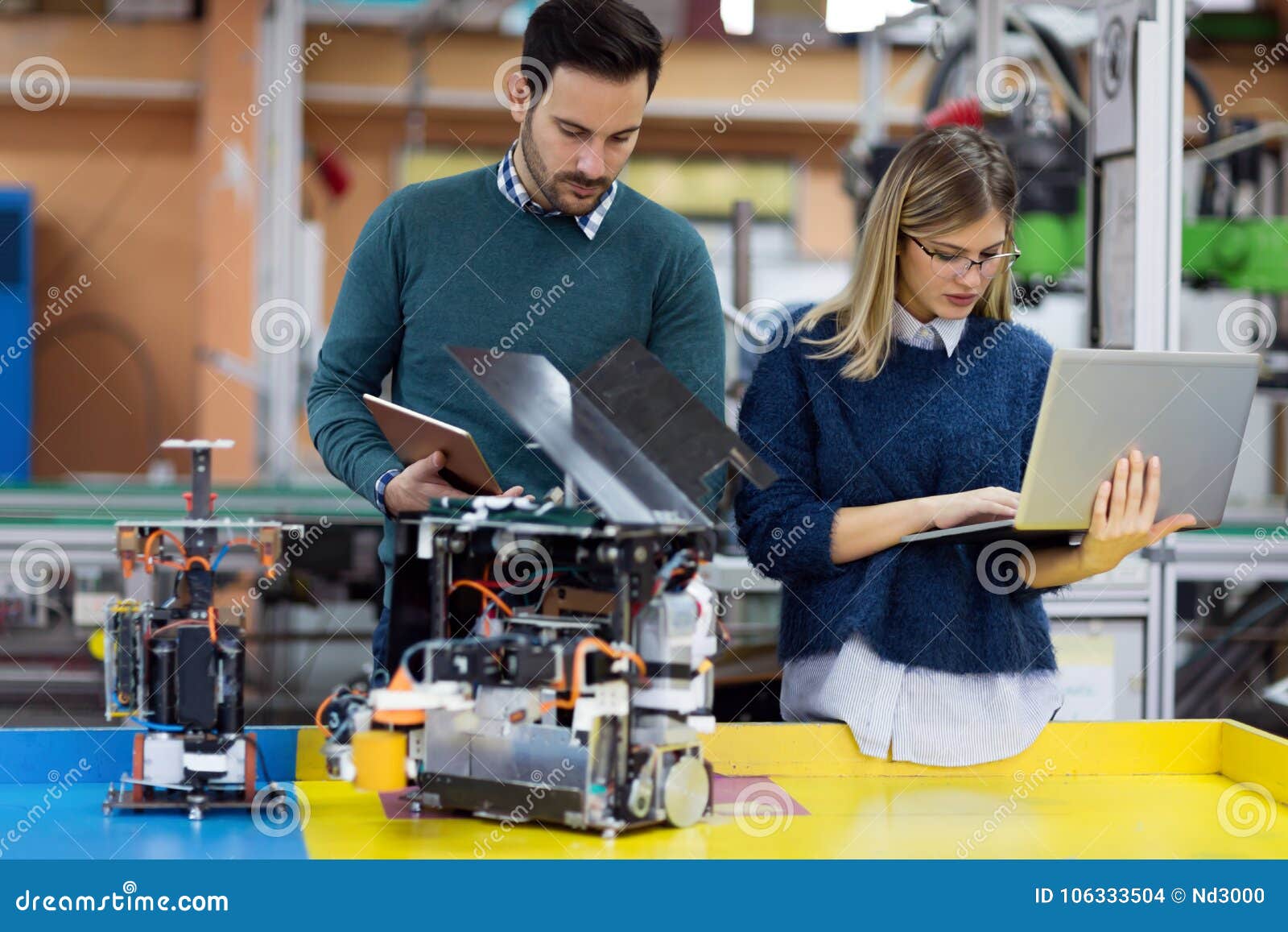 Young Students of Robotics Preparing Robot for Testing Stock Photo ...