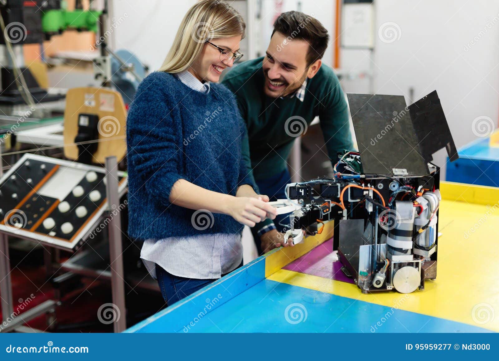 Young Students of Robotics Preparing Robot for Testing Stock Image ...
