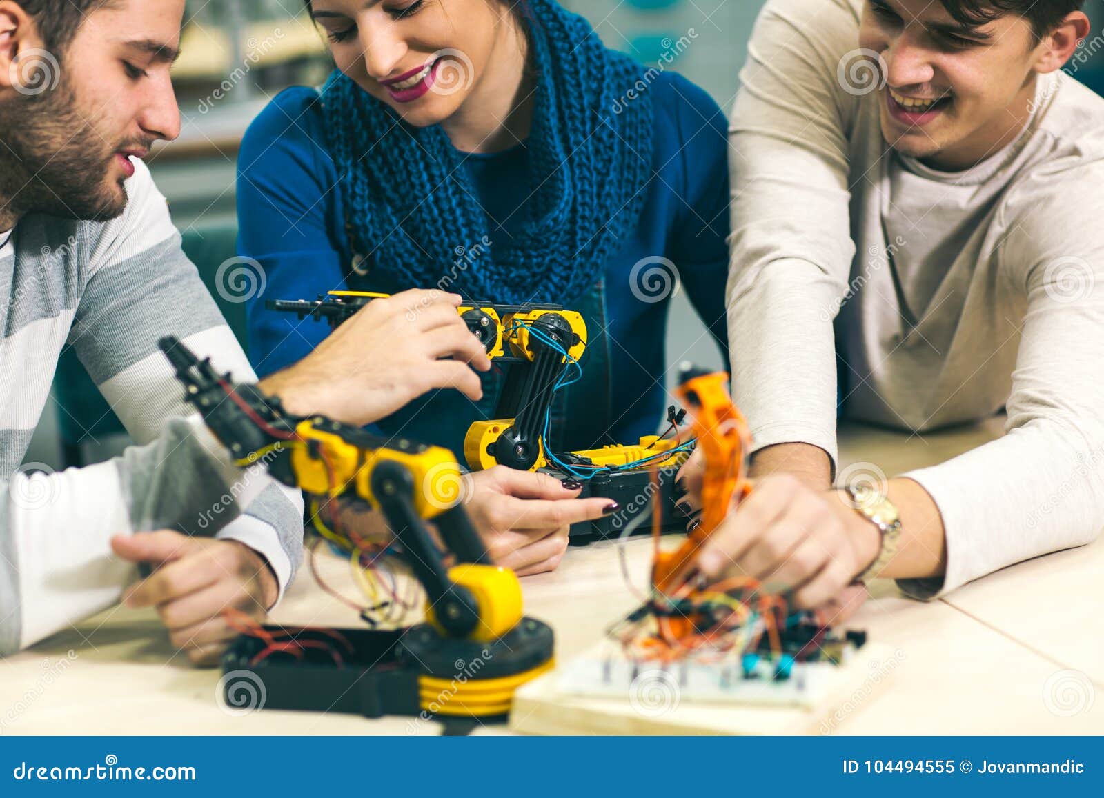 Students of Robotics Preparing Robot for Testing in Workshop Stock ... Students of Robotics Preparing Robot for Testing in Workshop Stock ...