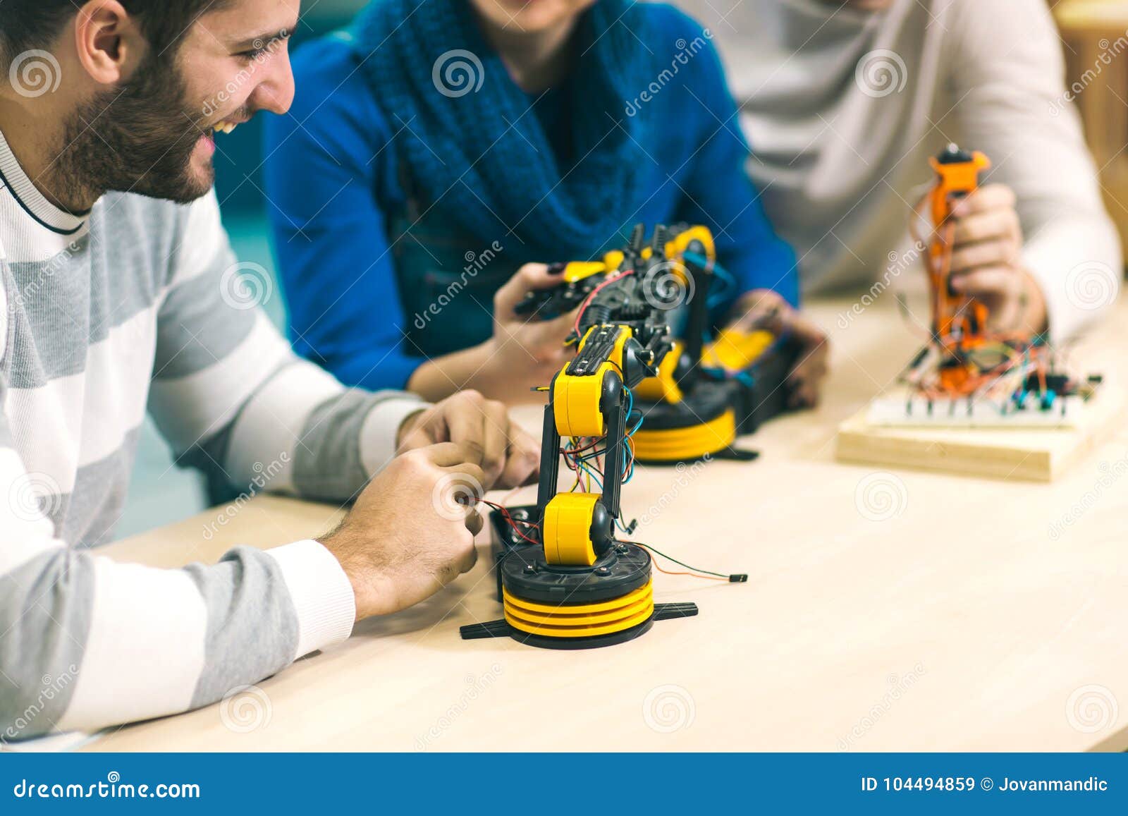 Students of Robotics Preparing Robot for Testing in Workshop Stock ... Students of Robotics Preparing Robot for Testing in Workshop Stock ...