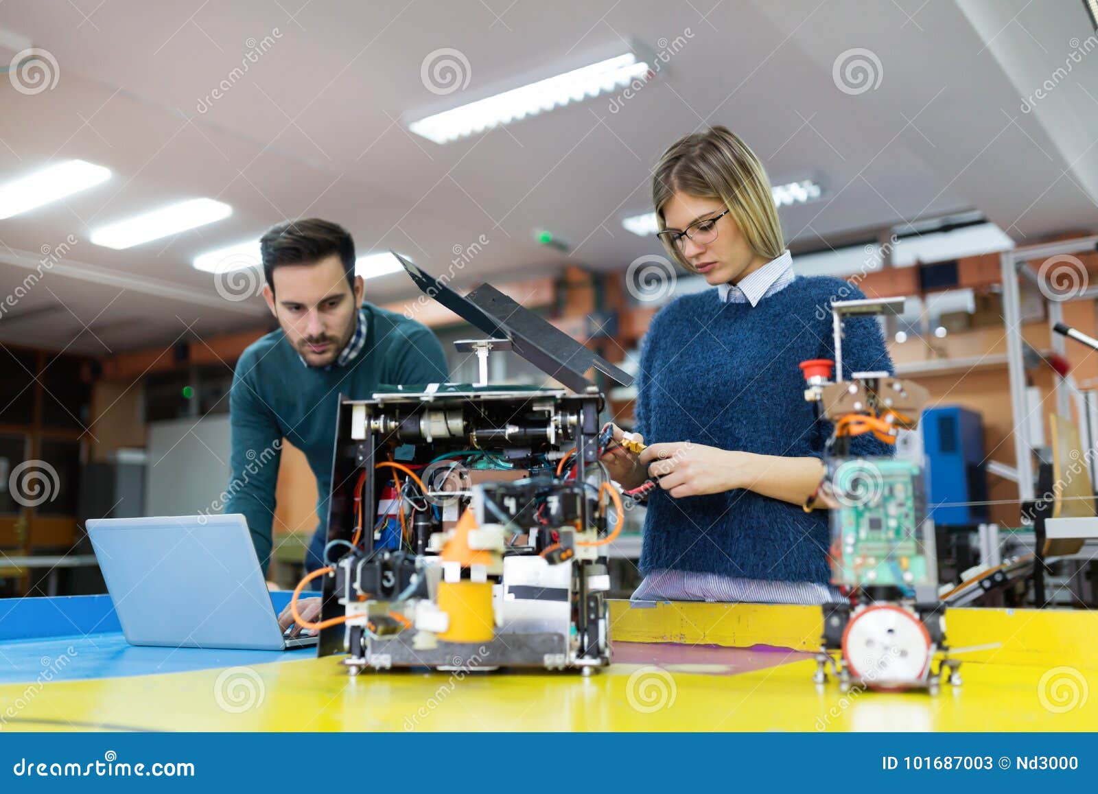 Young Students of Robotics Preparing Robot for Testing Stock Image ...