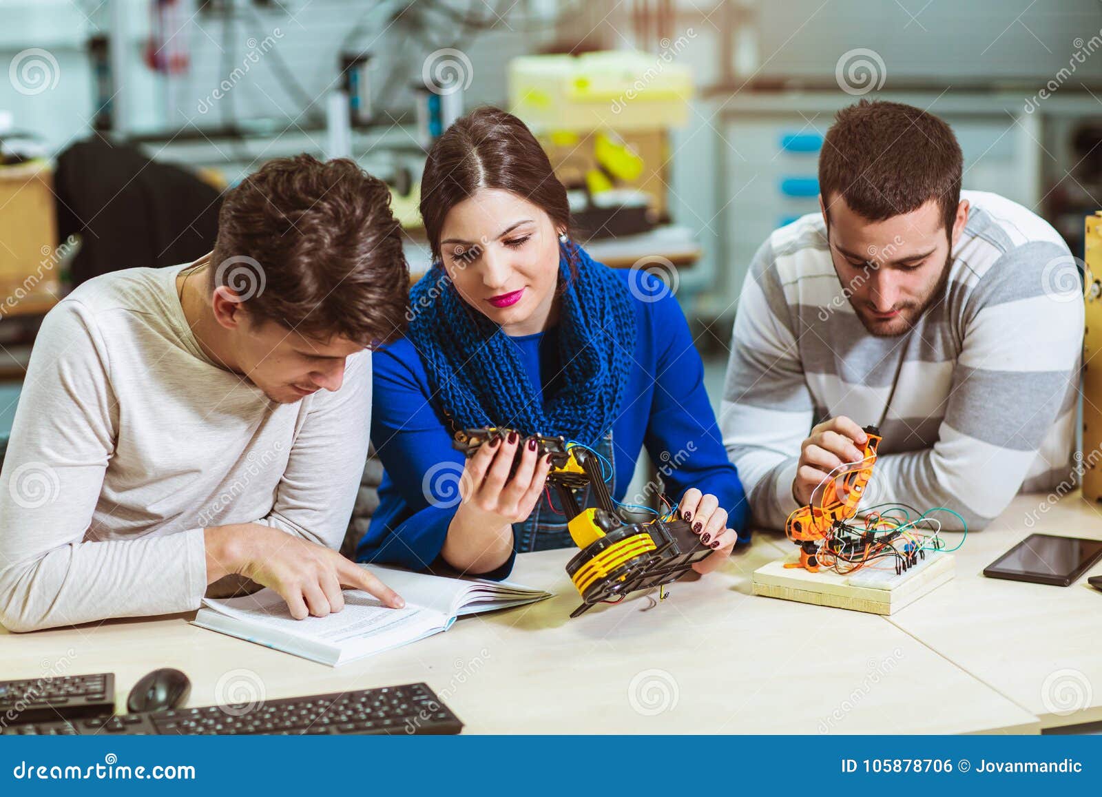 Young Students of Robotics Preparing Robot for Testing Stock Photo ...