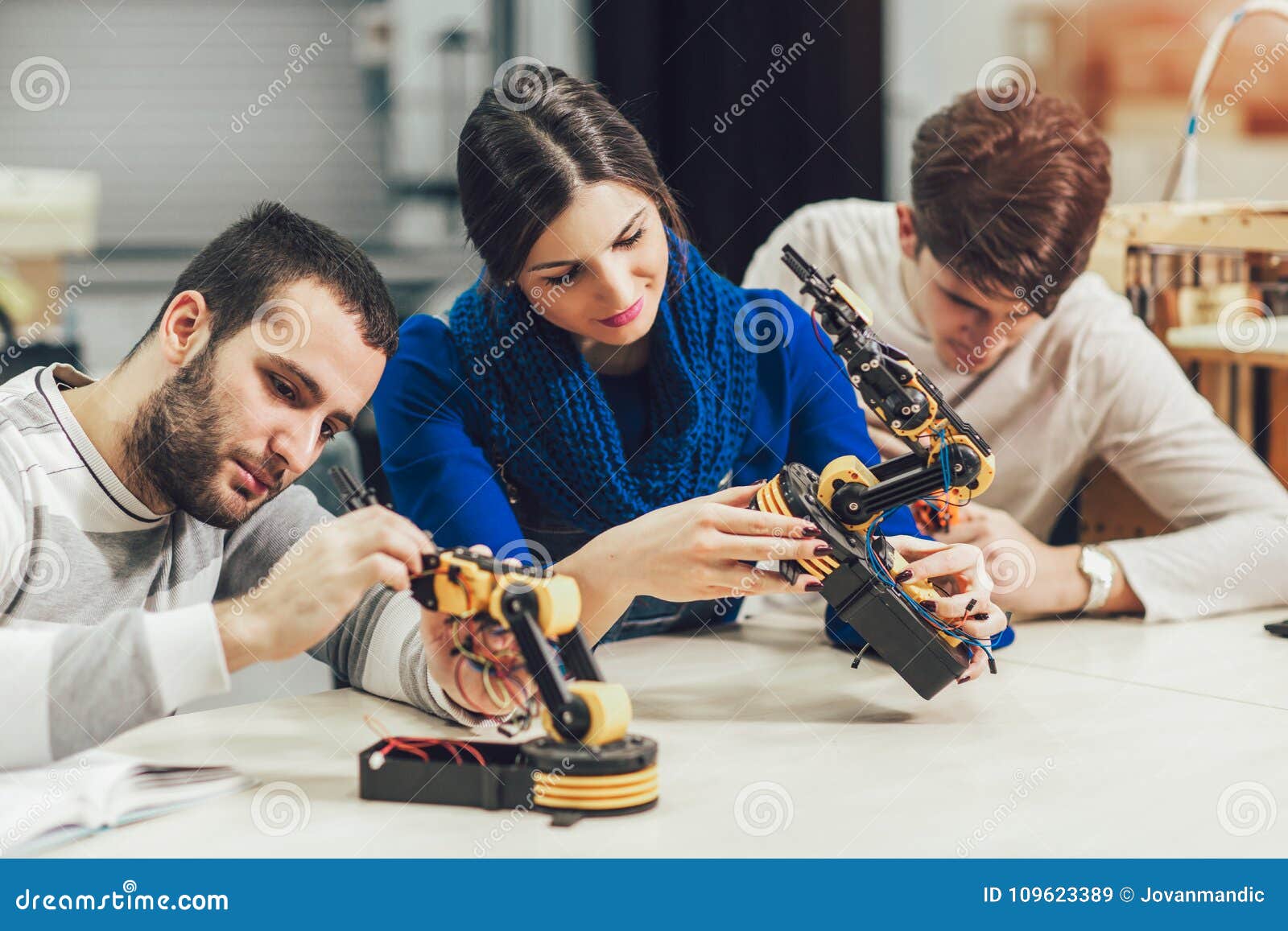 Young Students of Robotics Preparing Robot for Testing Stock Image ...