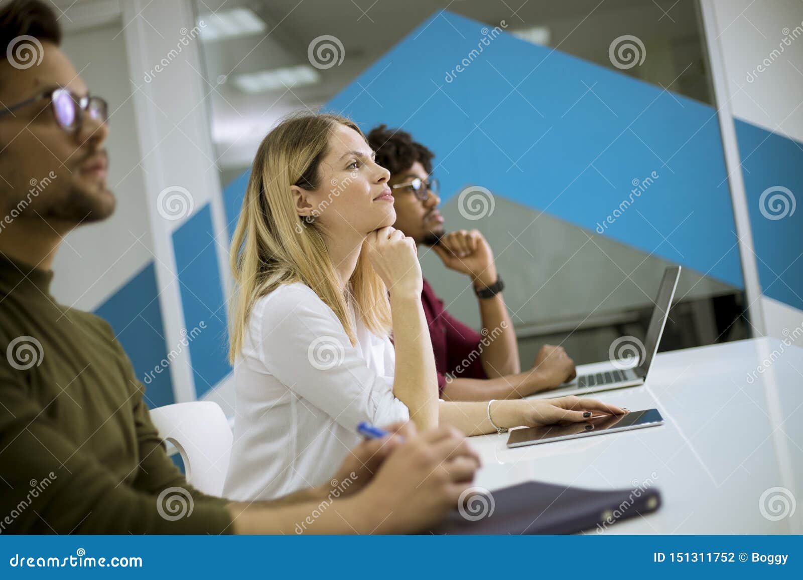 Young Students Sitting in the Classroom Stock Photo - Image of ...