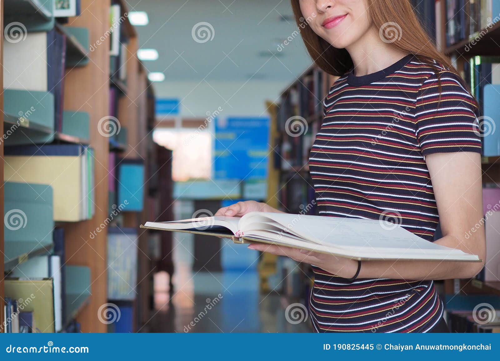 Young Students Stand To Read Books in the Library Stock Image - Image ...