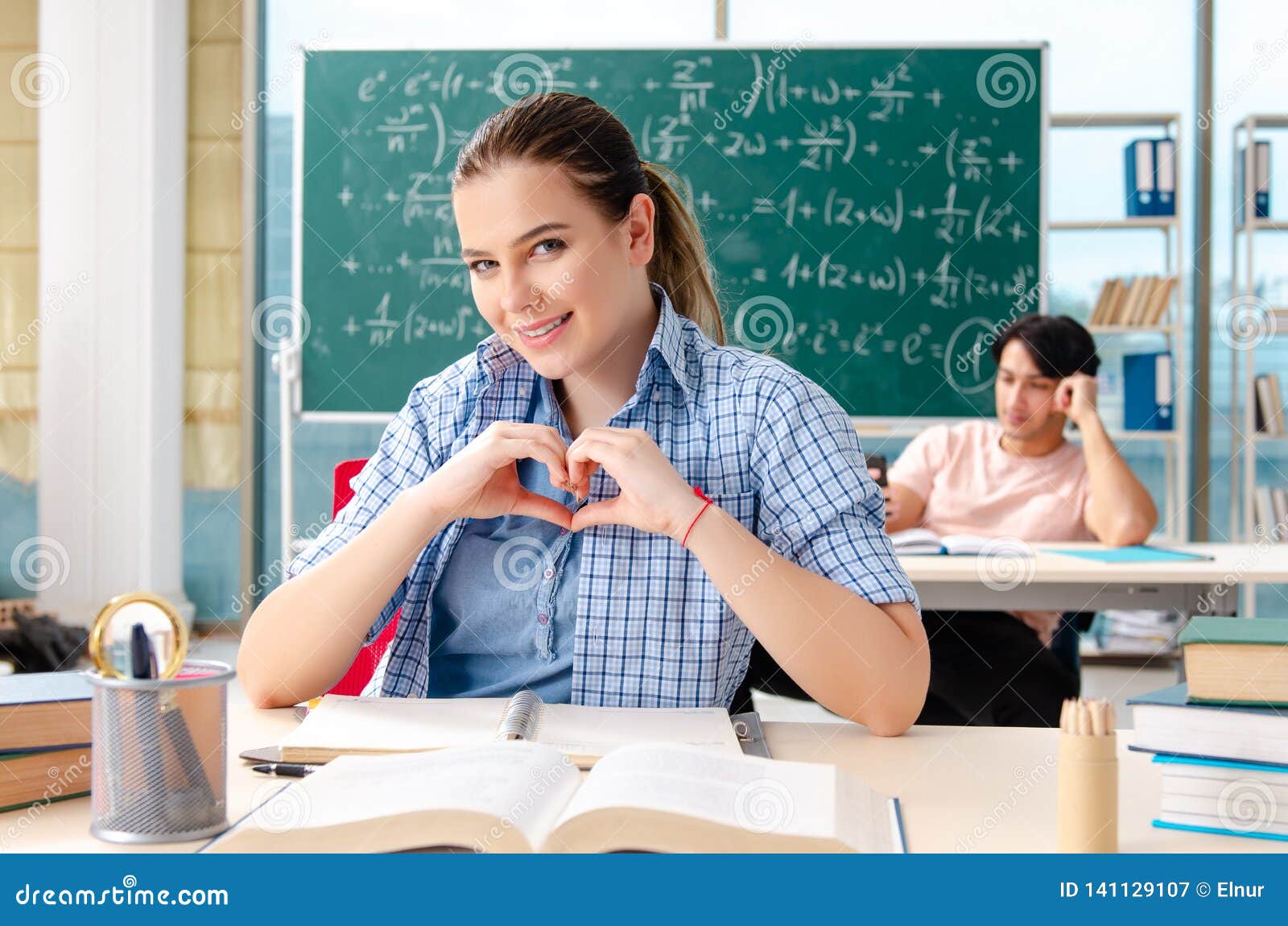 The Young Students Taking the Math Exam in Classroom Stock Image ...