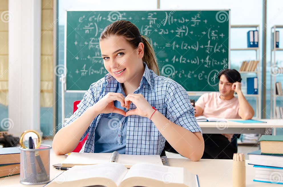 The Young Students Taking the Math Exam in Classroom Stock Image ...