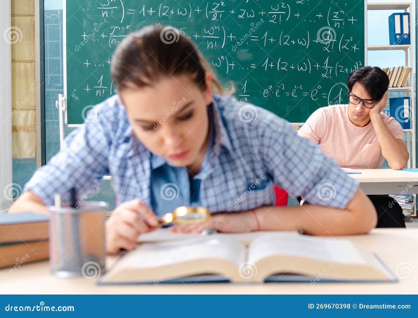 Young Students Taking the Math Exam in Classroom Stock Photo - Image of ...
