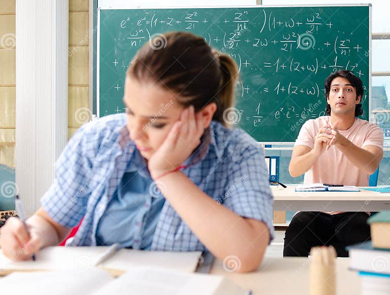 Young Students Taking the Math Exam in Classroom Stock Photo - Image of ...