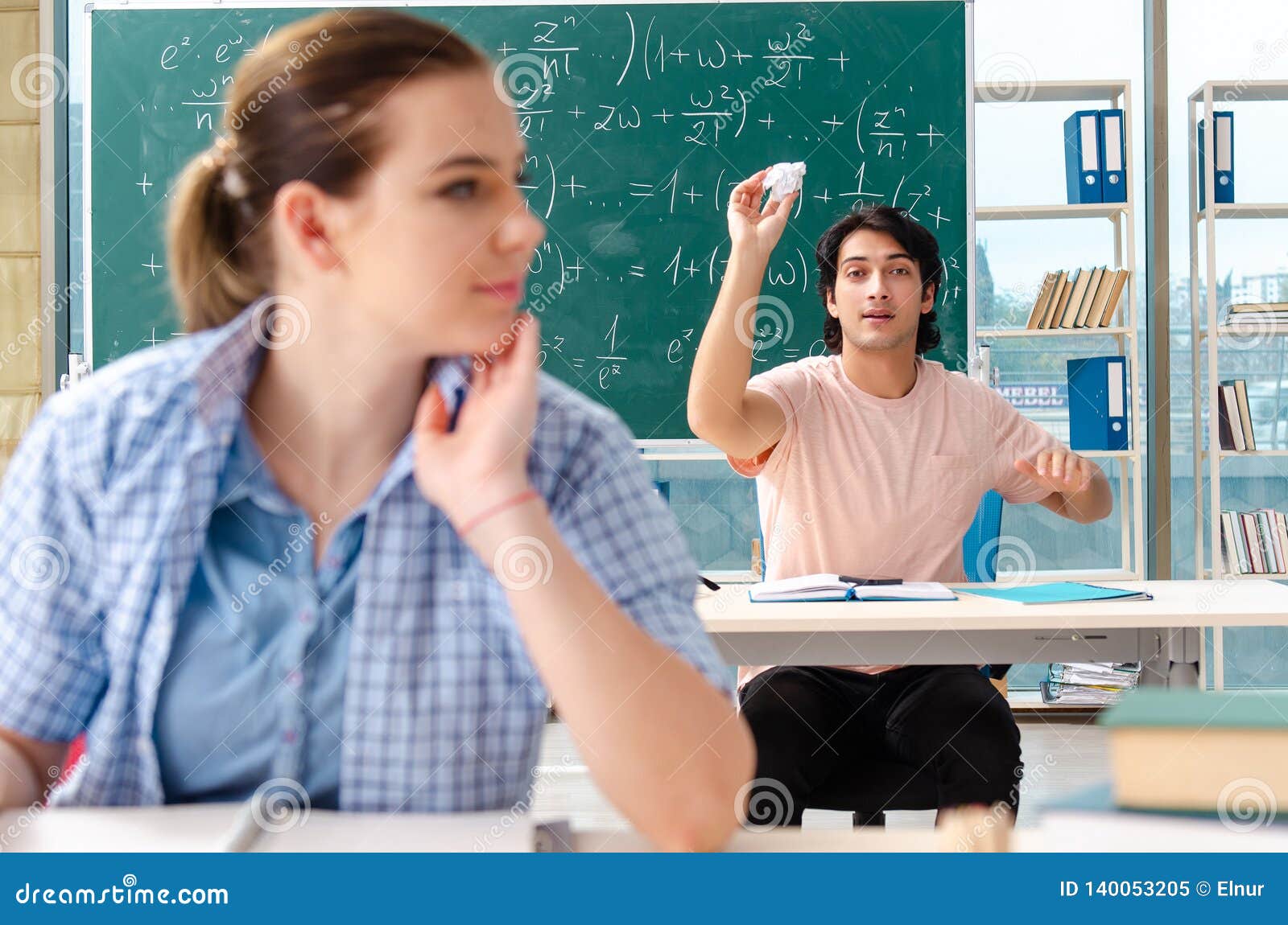 The Young Students Taking the Math Exam in Classroom Stock Image ...