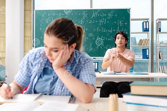 The Young Students Taking the Math Exam in Classroom Stock Image ...